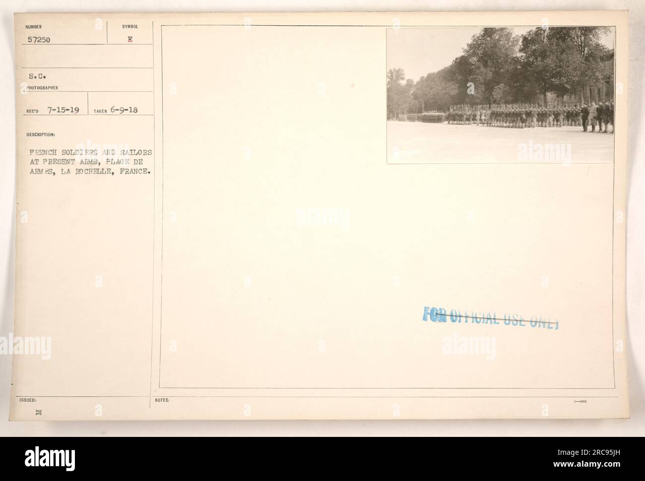 French soldiers and sailors stand at attention in Place de Armes, La ...
