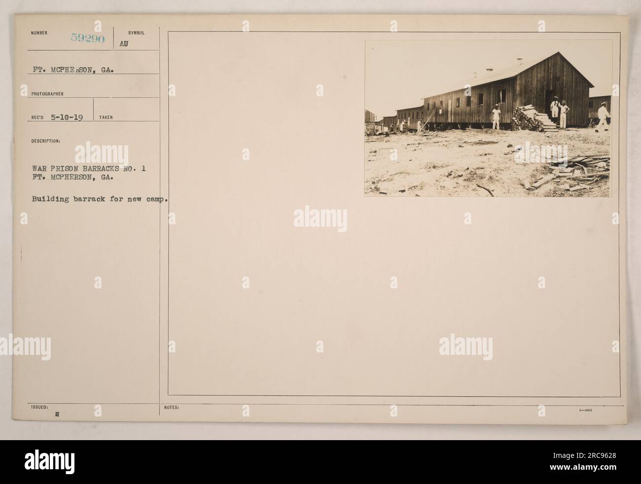 Caption: "War prison barracks being constructed at Camp Number, Fort ...