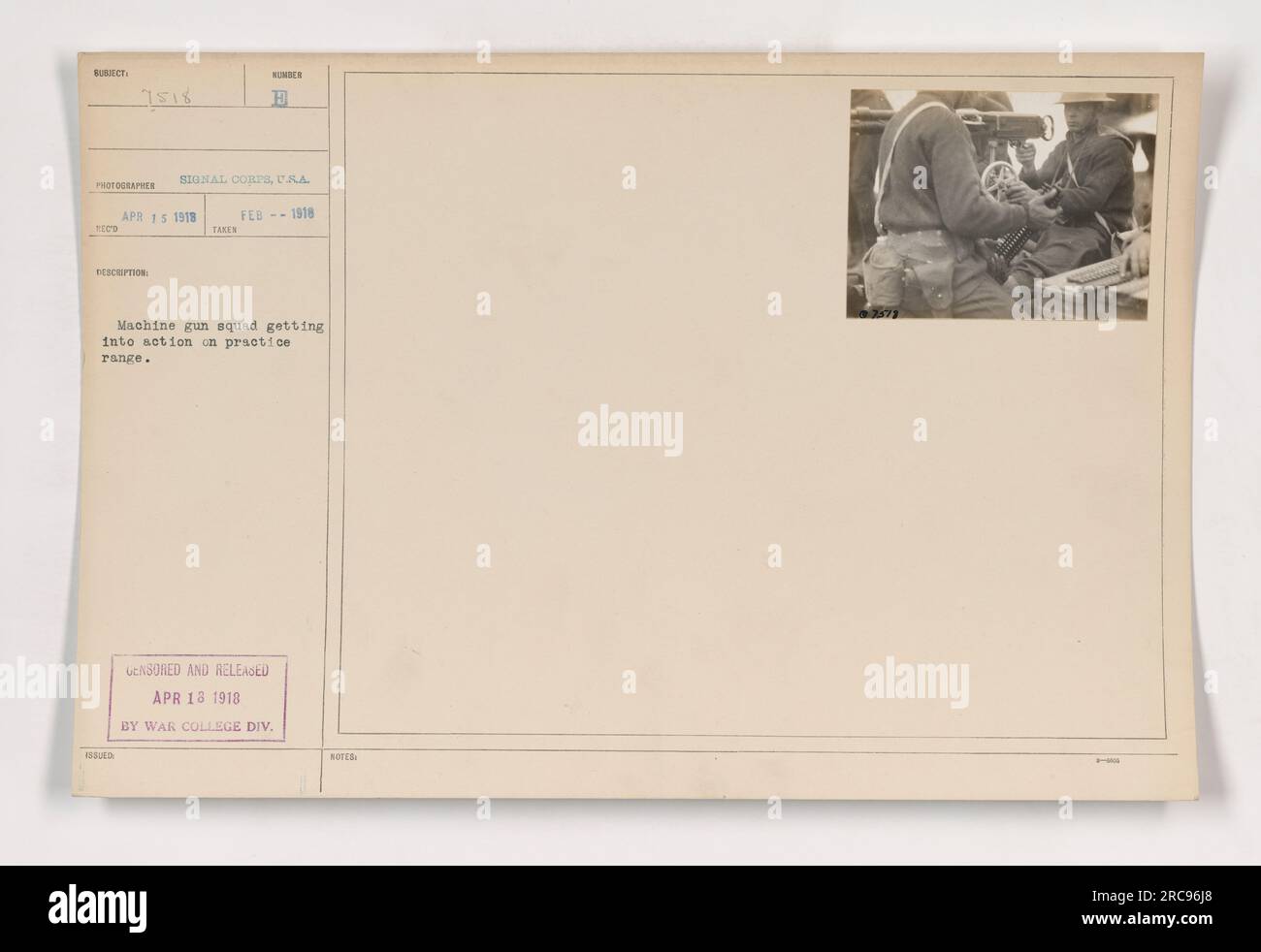 A machine-gun squad prepares for action on a practice range in ...