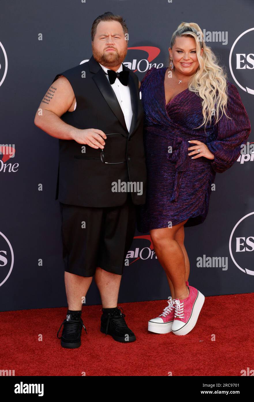 Hollywood, Ca. 12th July, 2023. Paul Walter Hauser, Amy Boland Hauser ...