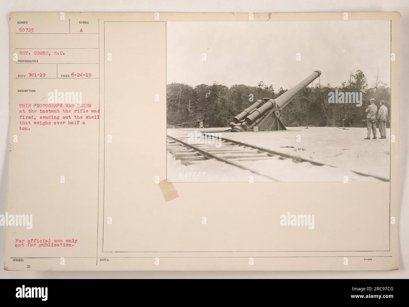 Firing of a rifle, capturing the moment when a shell weighing over half ...