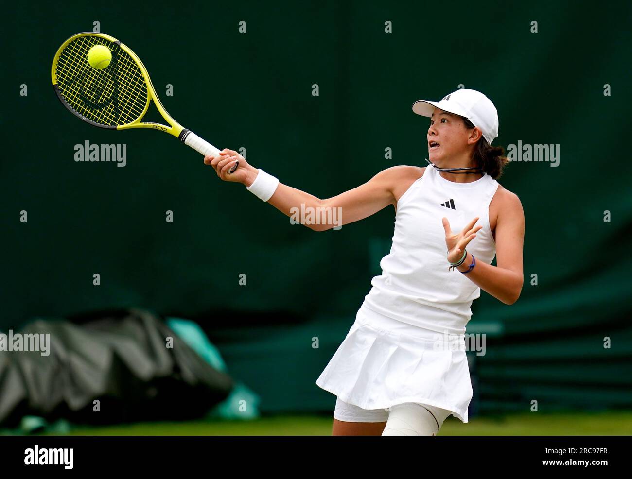 Ena Koike in action against Alina Korneeva in their Girl's Singles ...