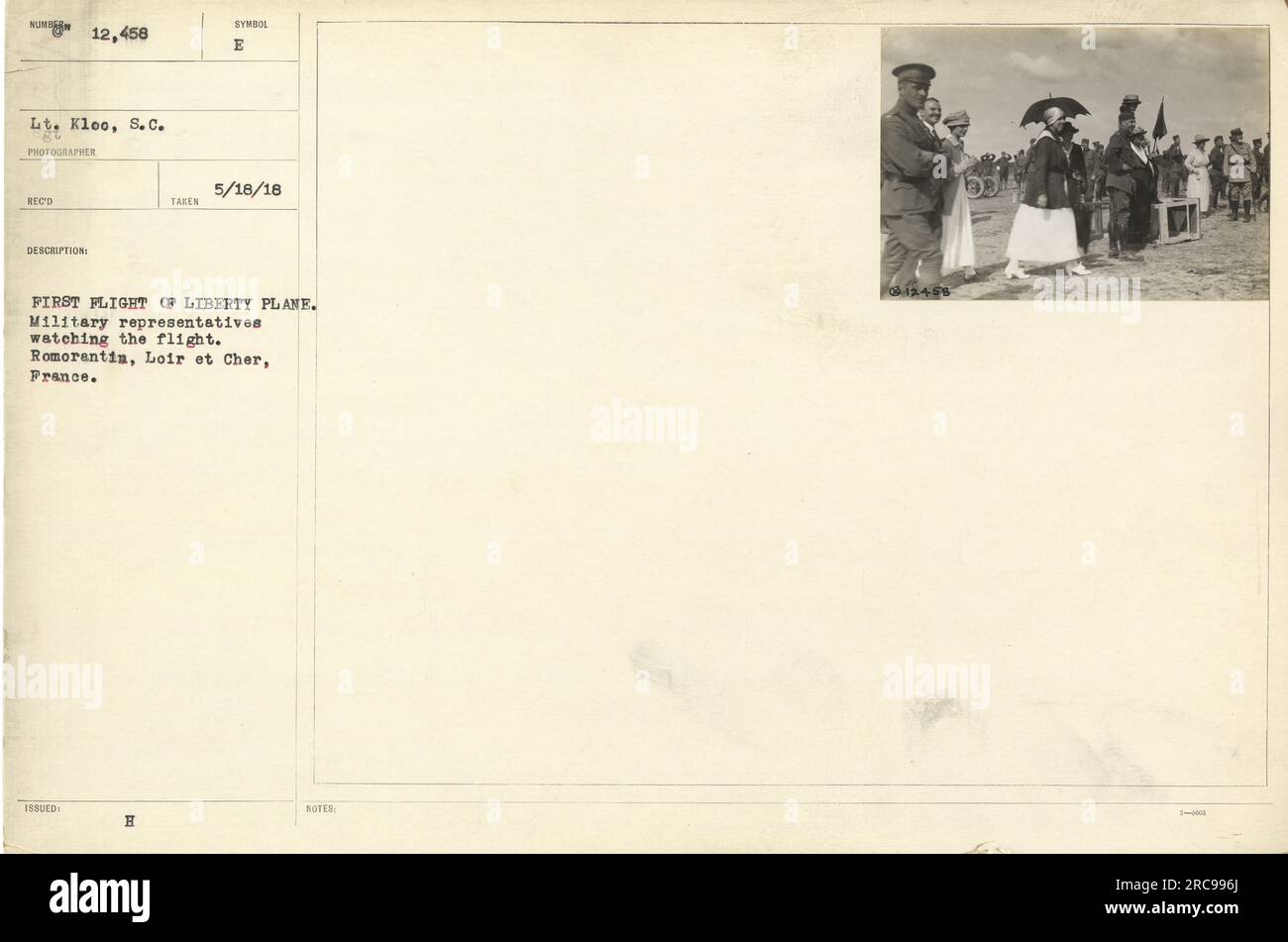 Military representatives observing the first flight of a Liberty plane ...