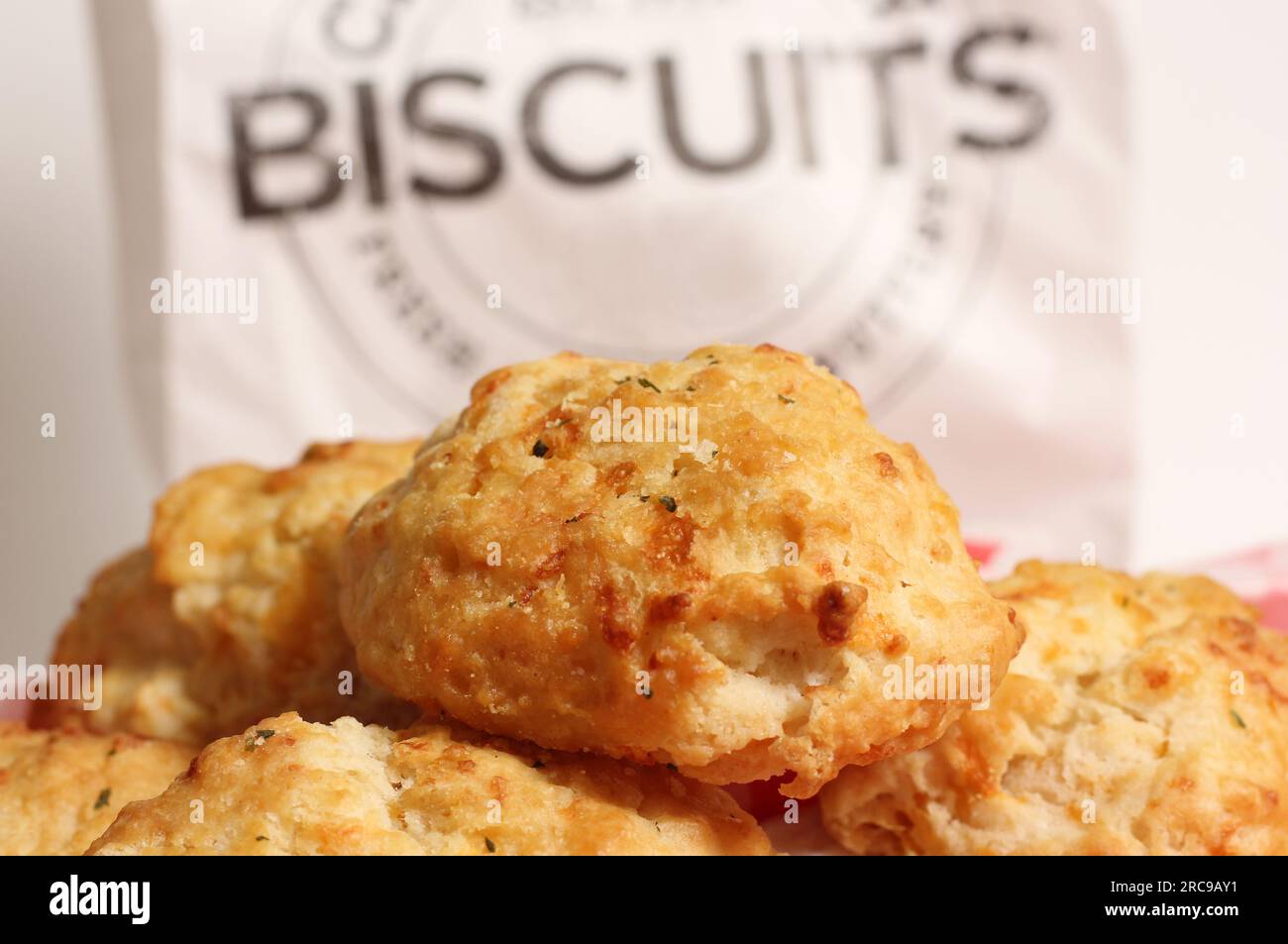 Garlic Cheese Biscuits With Biscuit Sign in Background Shallow DOF ...