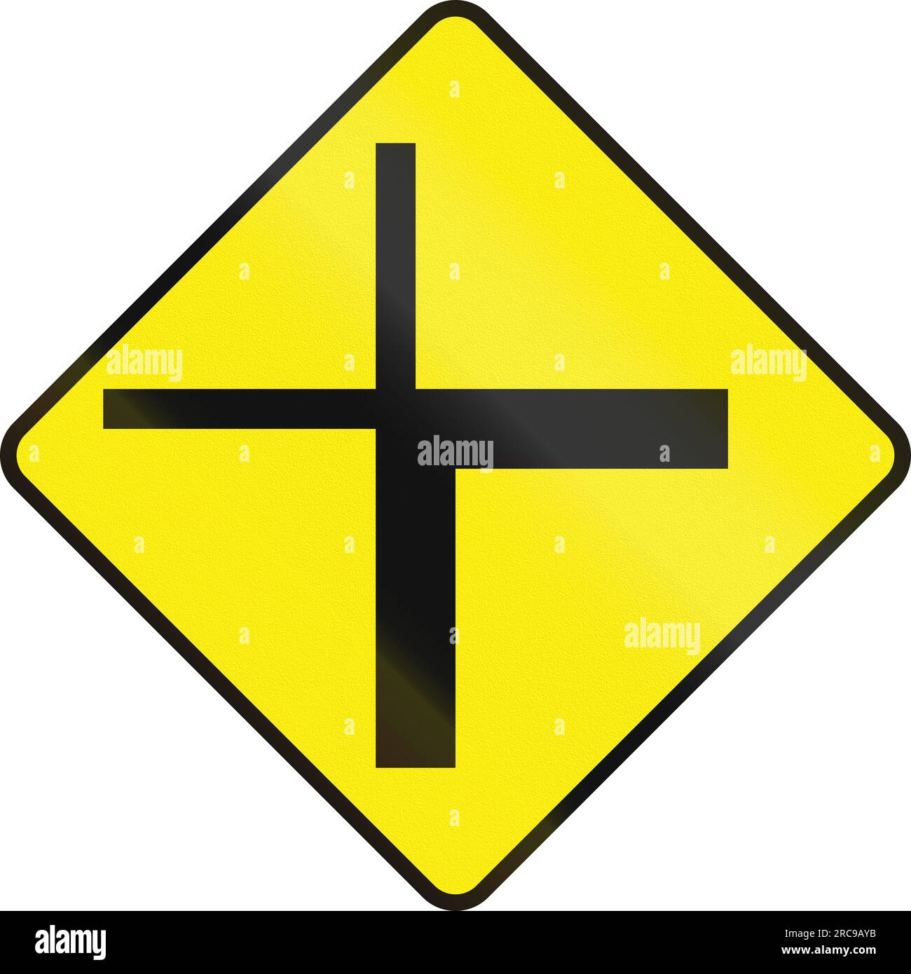 Irish road warning sign - 4-way Intersection ahead Stock Photo - Alamy
