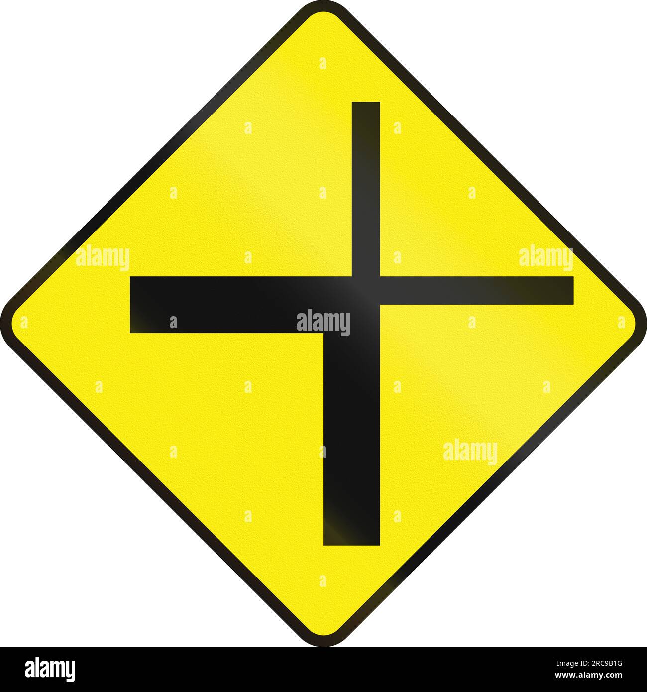 Irish road warning sign - 4-way Intersection ahead Stock Photo - Alamy
