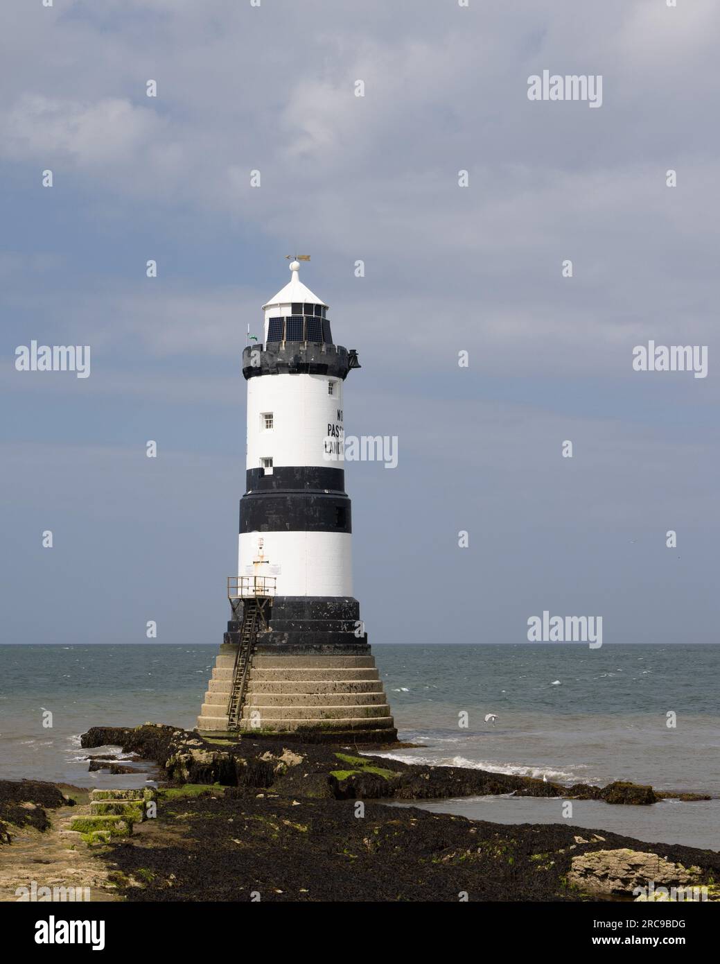 Trwyn Du lighthouse on Penmon Point Anglesey, Wales Stock Photo - Alamy