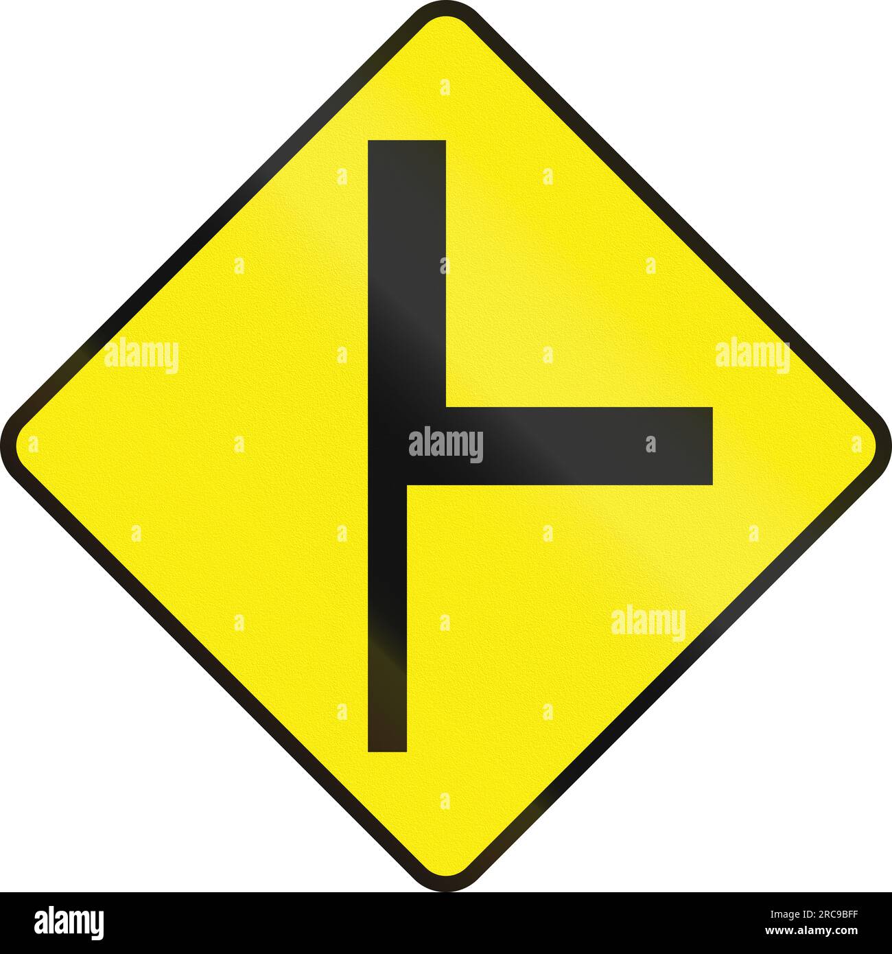 Irish road warning sign - T-Intersection ahead Stock Photo - Alamy
