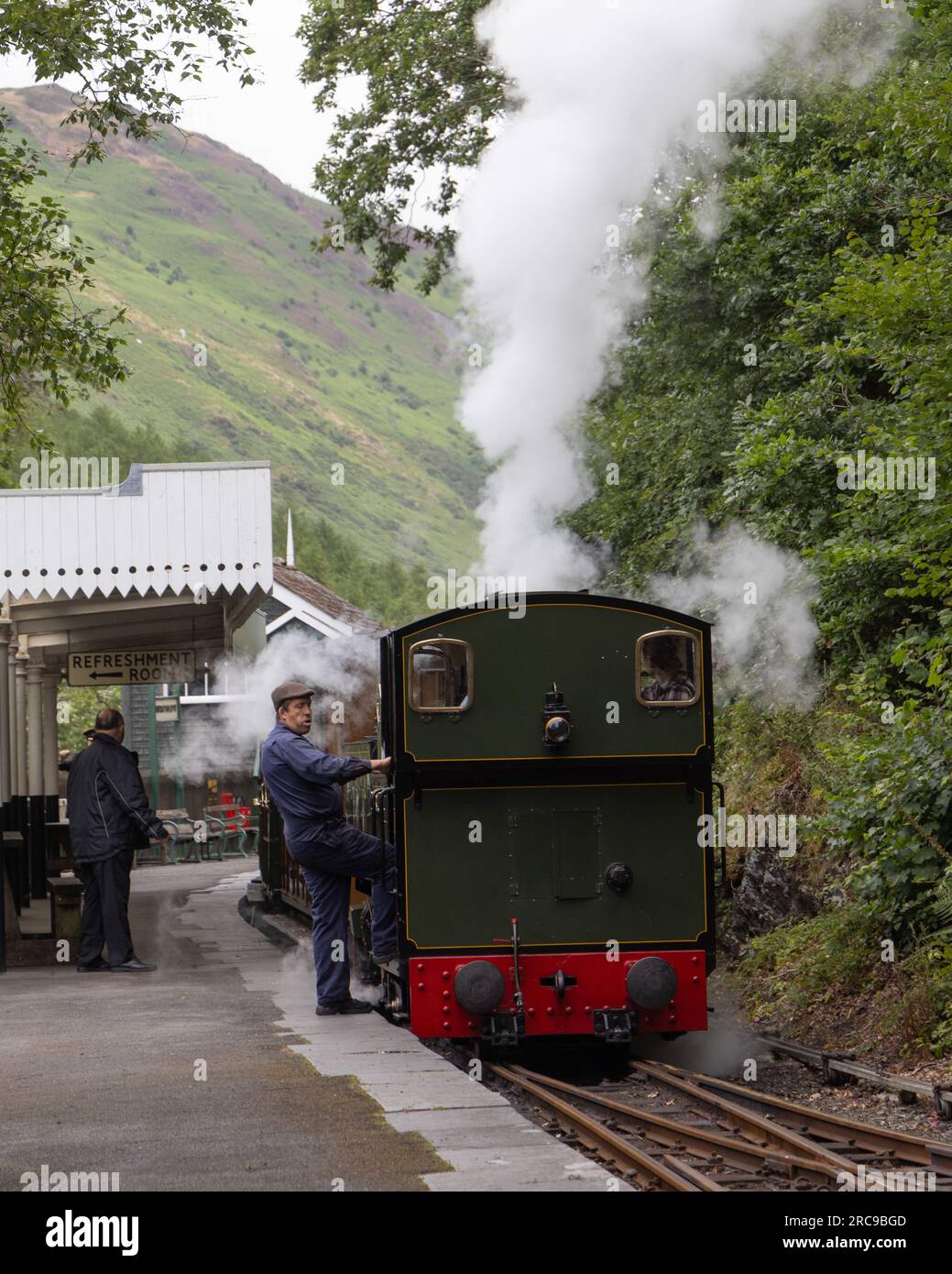 Tallyllyn Railway narrow gauge steam locomotive Tom Rolt heads a train ...