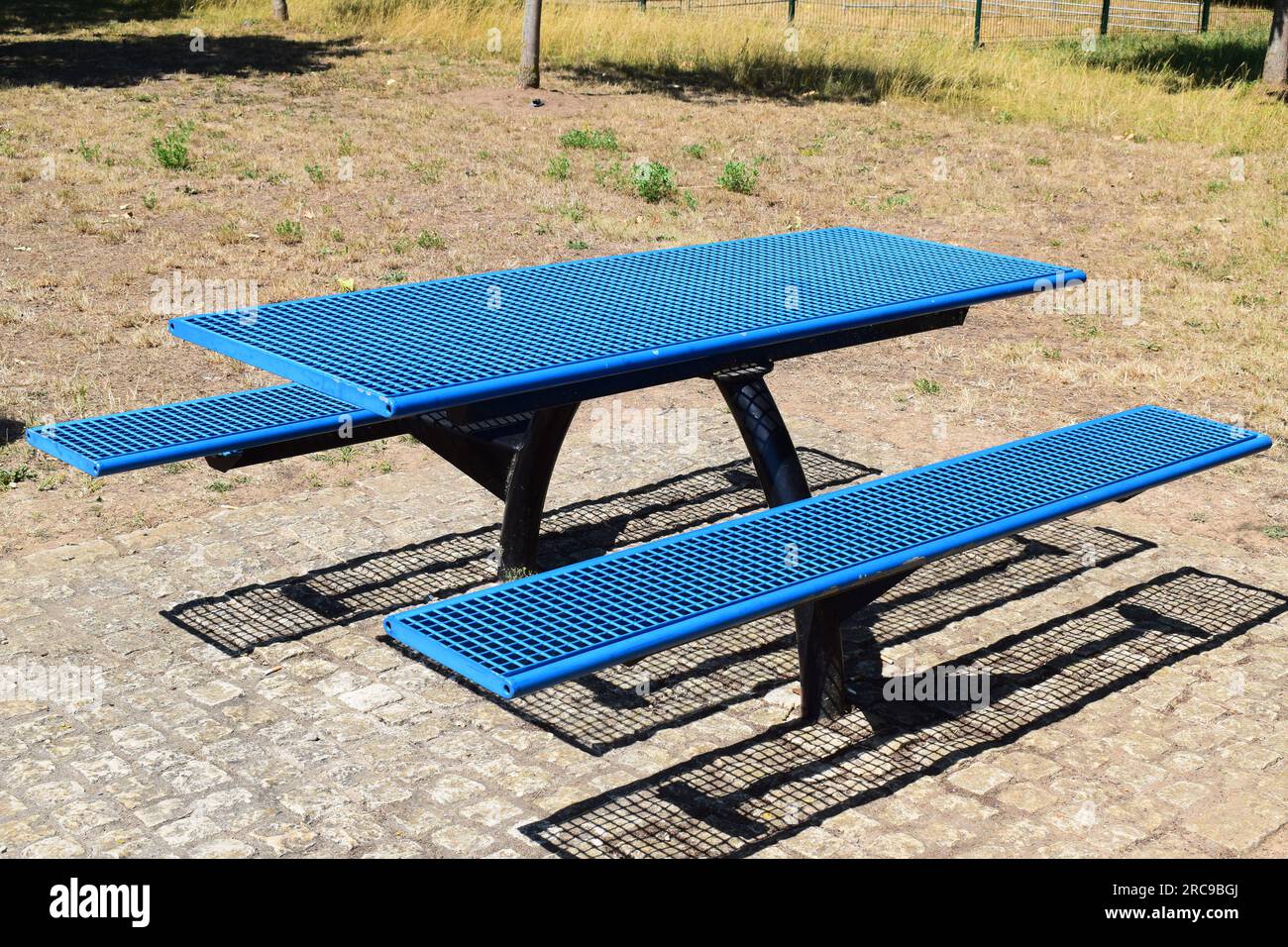 light blue park benches and table Stock Photo - Alamy