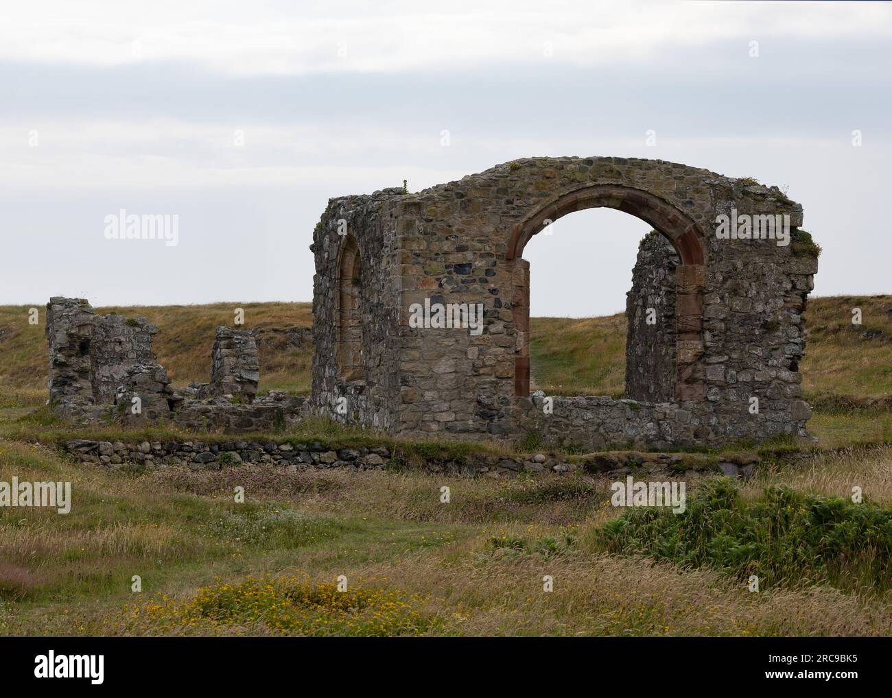 the ruined remains of St Dwynwen's Church on Llanddwynn Island ...