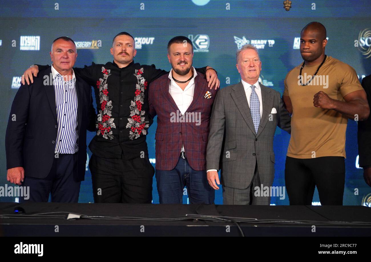 Boxing manager Egis Klimas (left), Oleksandr Usyk, boxing promoters ...