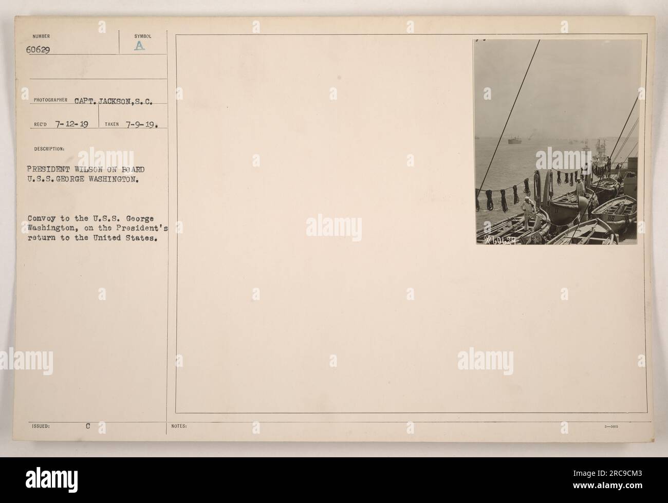 Caption: President Wilson on board the U.S.S. George Washington during ...