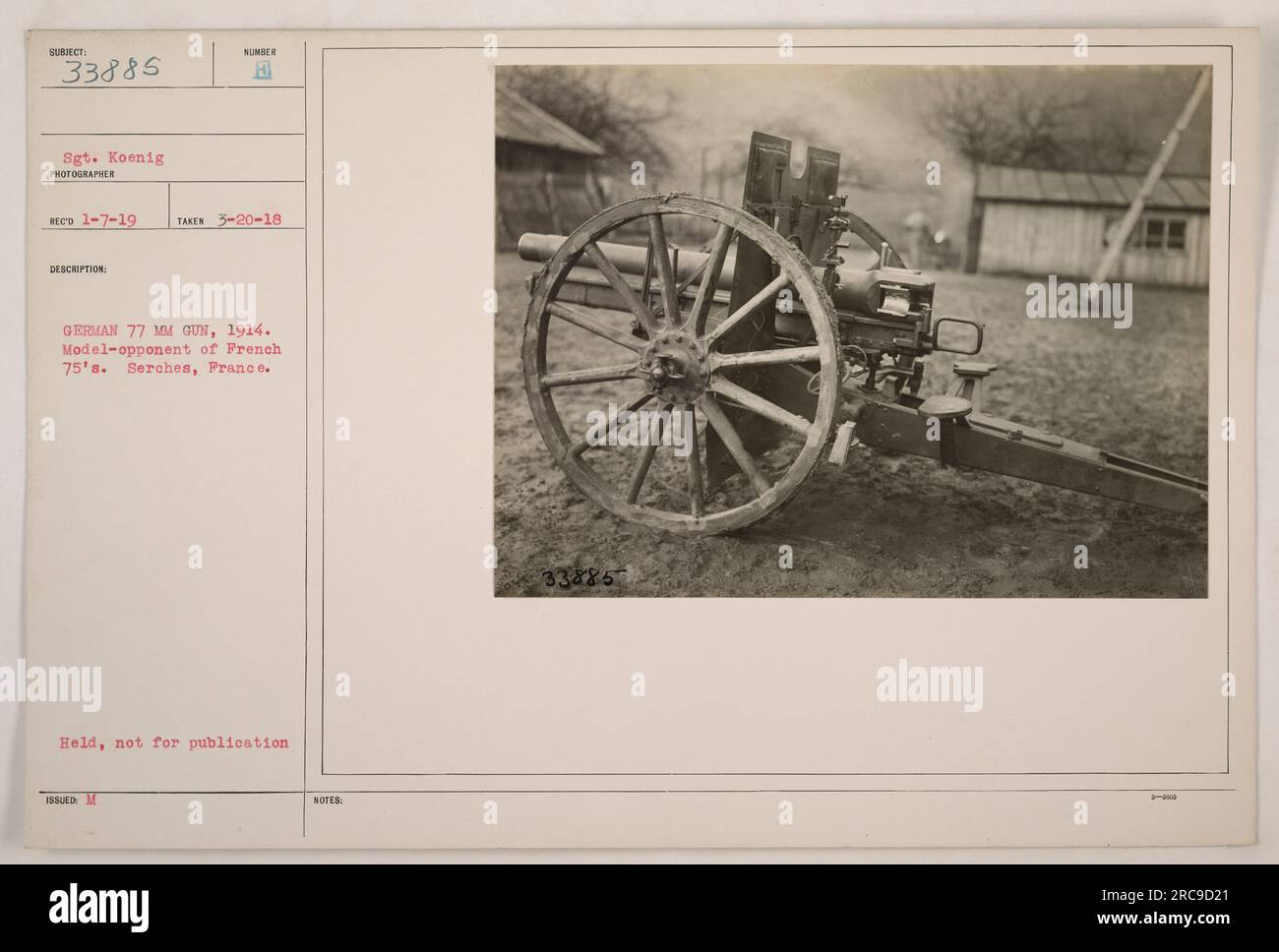 Sergeant Koenig standing next to a captured German 77 mm gun in Sumber ...