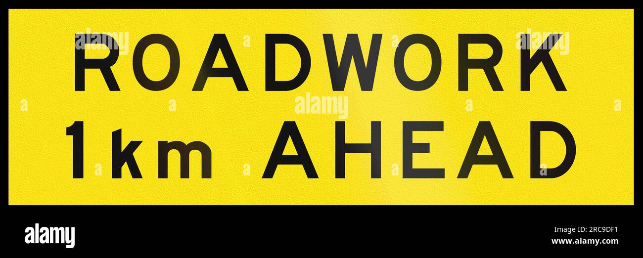 An Australian temporary road sign - Roadwork 1 km ahead Stock Photo - Alamy