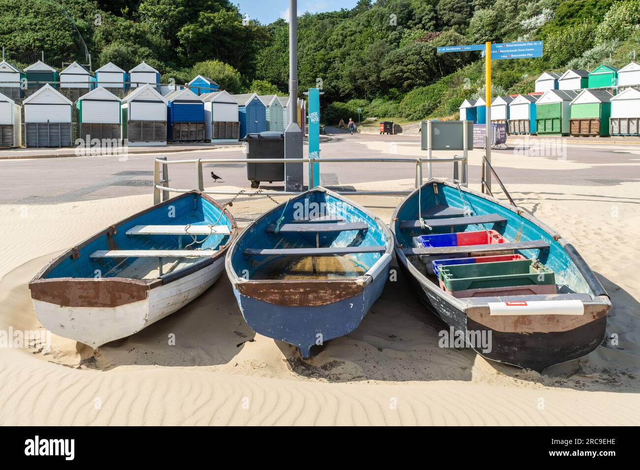 Middle Chine, Bournemouth, UK - July 12th 2023: Three rowboats on the ...
