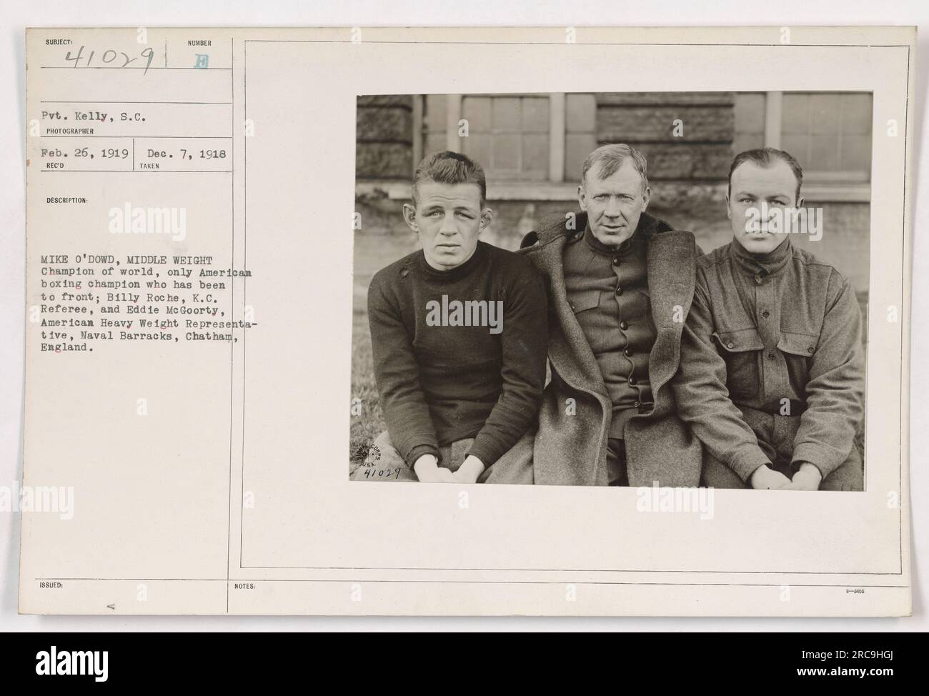 Pvt. Kelly, s.c., is photographed along with Mike O'Dowd, the ...