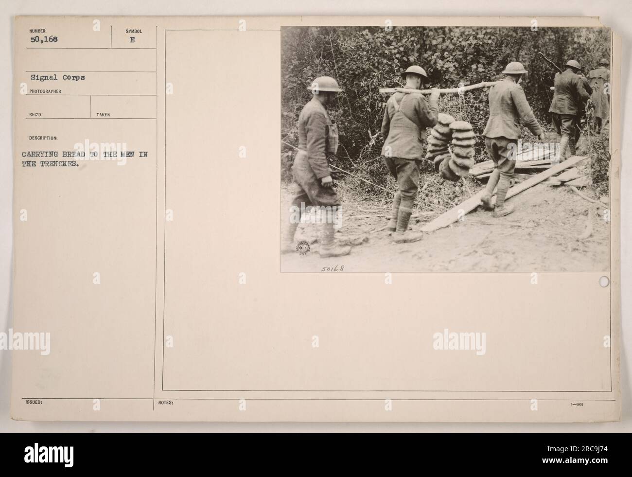 Soldier delivering loaves of bread to their comrades in the trenches ...