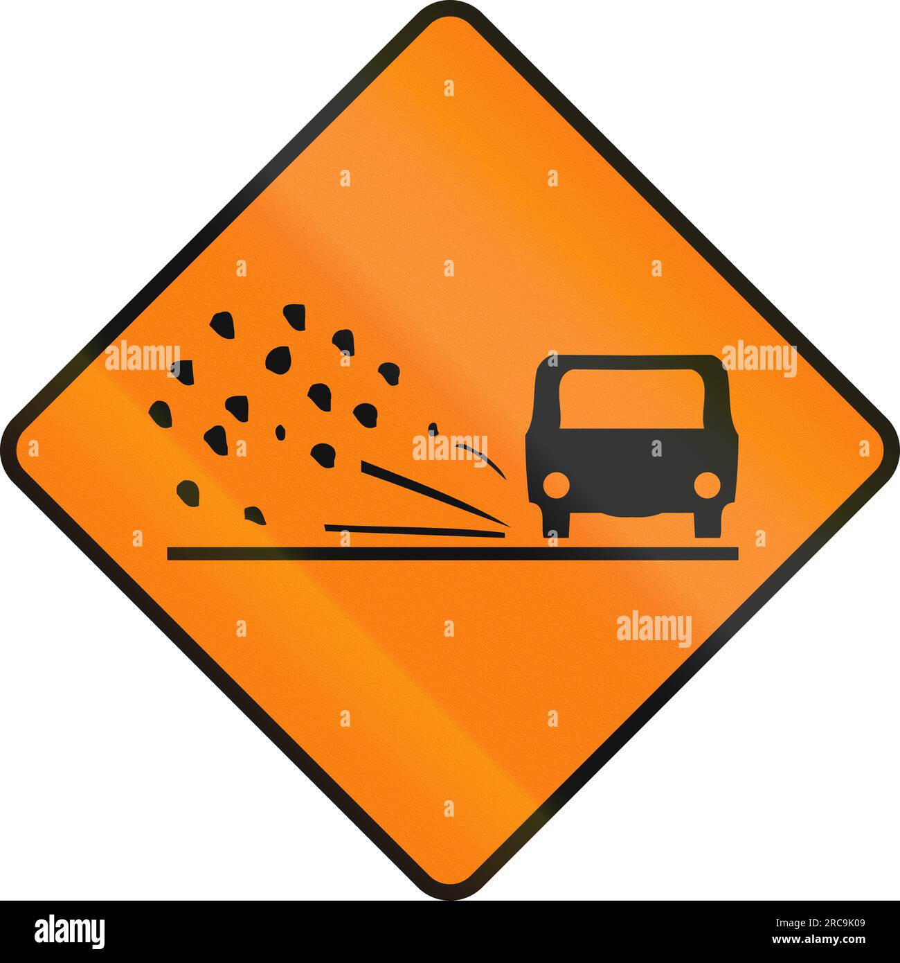 Temporary warning road sign in Ireland: Loose chippings Stock Photo - Alamy