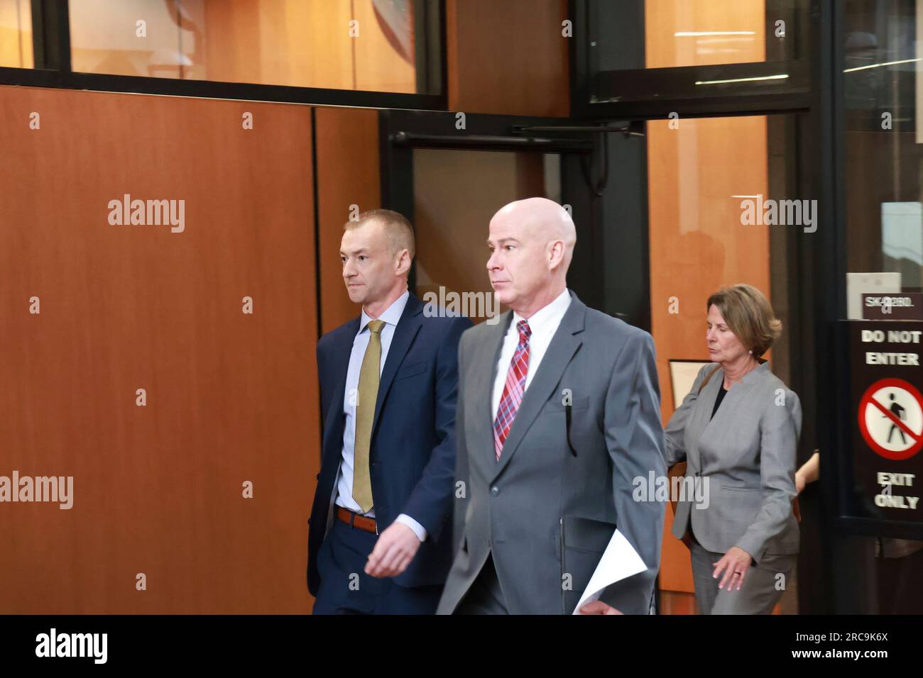 Former Minneapolis Police Officer Brian Cummings, left, leaves court on ...