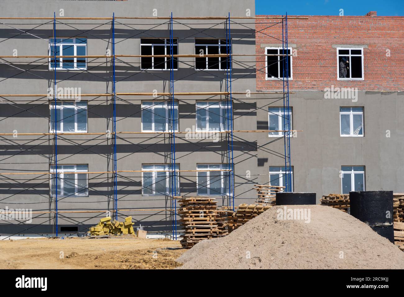 Facade restoration work. Scaffolding in front of the facade. Building ...