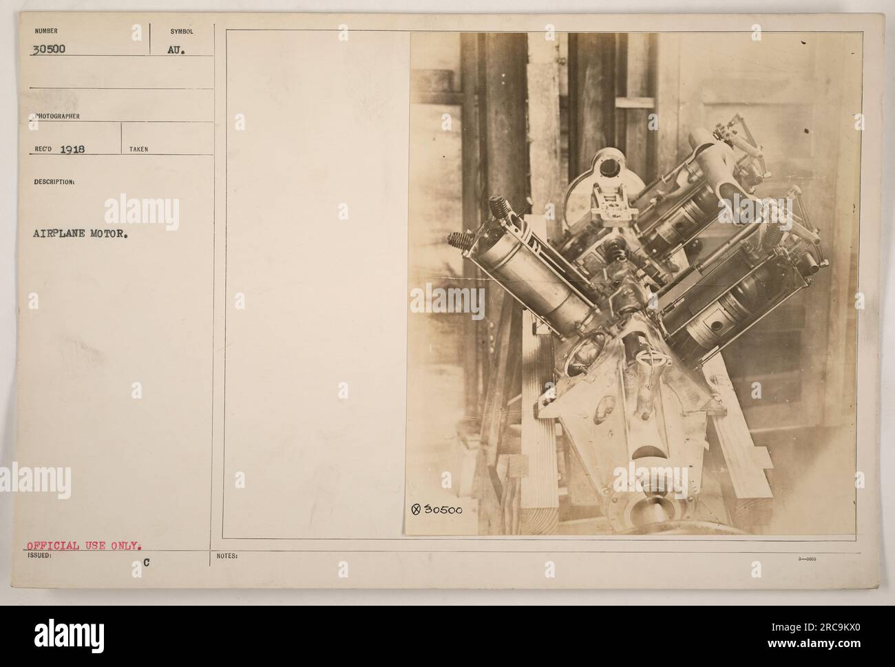 Caption: Image showcases an airplane engine being inspected during ...