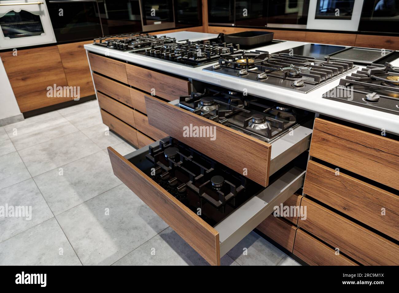Modern cooking stoves on display in the store Stock Photo - Alamy