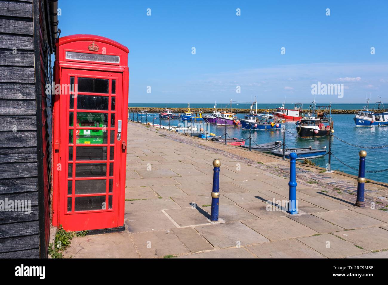 Folkestone, UK - 9 July 2023: Red phone booth at the Fish Market Stock ...