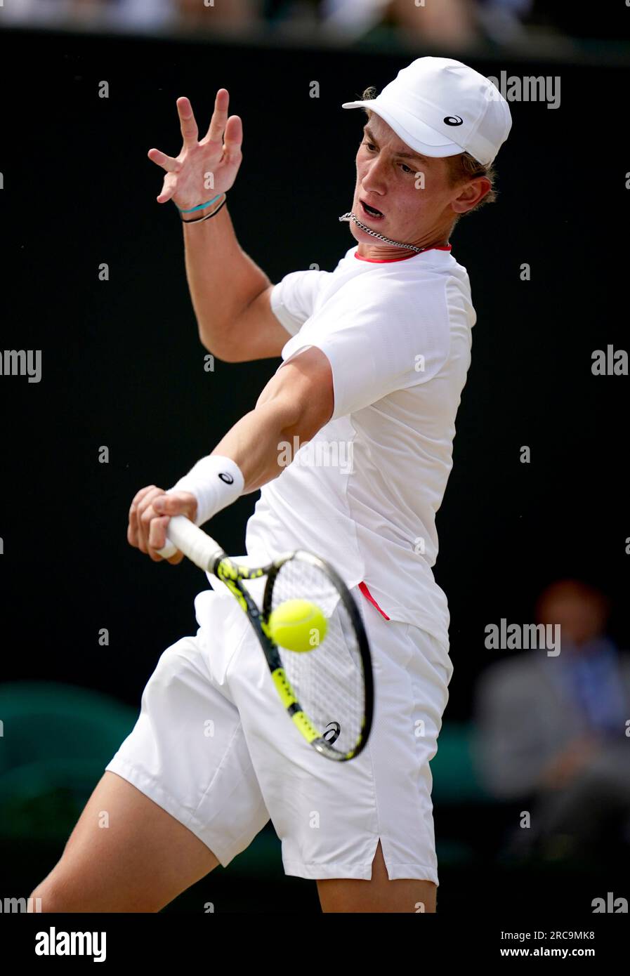Henry Searle in action against Joao Fonseca in their Boy's Singles ...