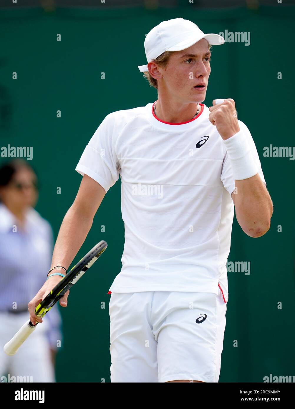 Henry Searle celebrates a point against Joao Fonseca in their Boy's ...