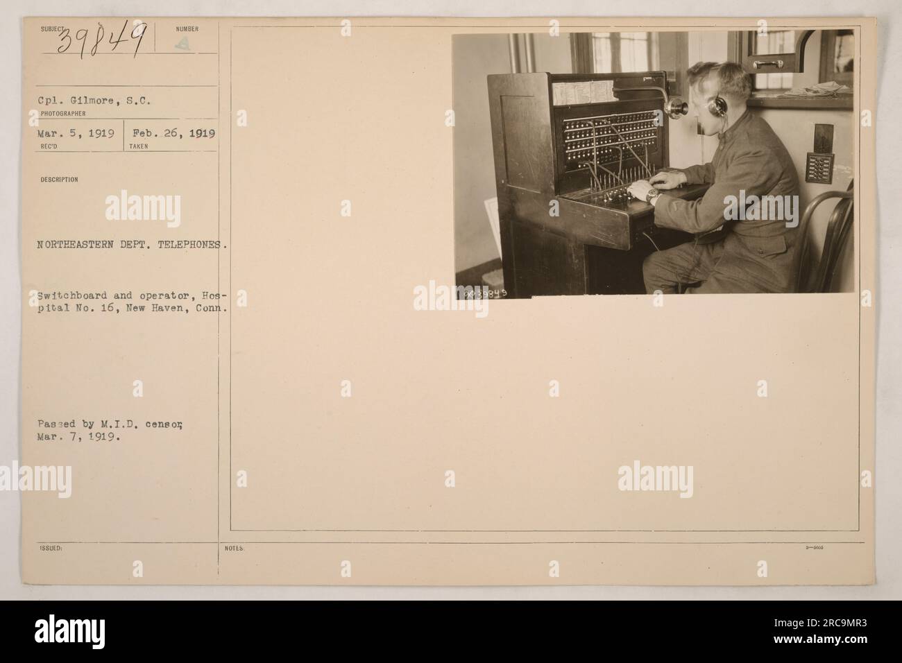 "Switchboard operator at Hospital No. 16 in New Haven, Conn., receives ...