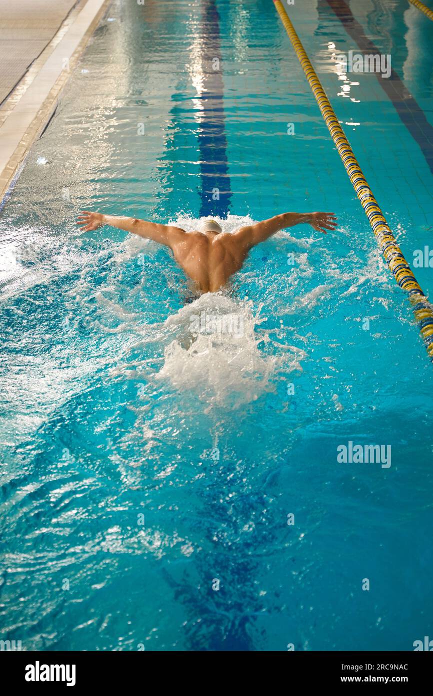 Athlete doing workout for recovery in the pool Stock Photo - Alamy