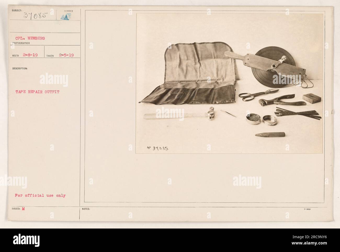 "Cpl. Newberg repairing a tape using a tape repair outfit in World War ...