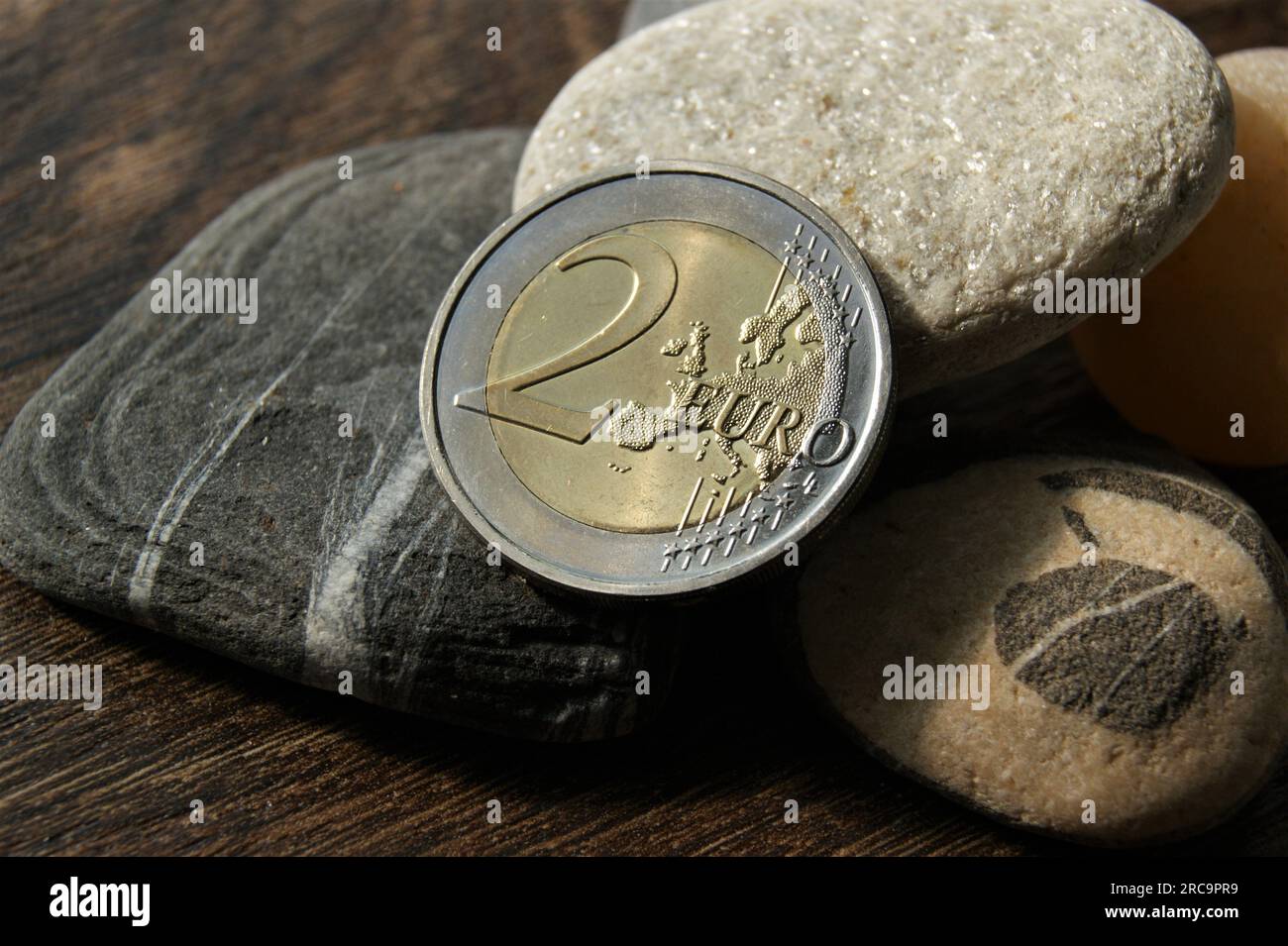2 euro coin reverse. New 2 euro coin and stones Stock Photo - Alamy