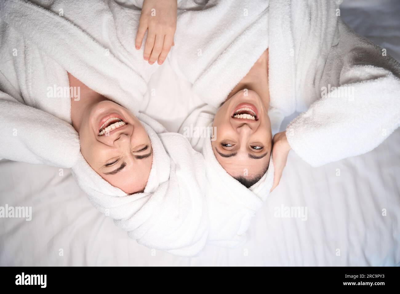 Woman spa indoor robe smile hi-res stock photography and images - Alamy
