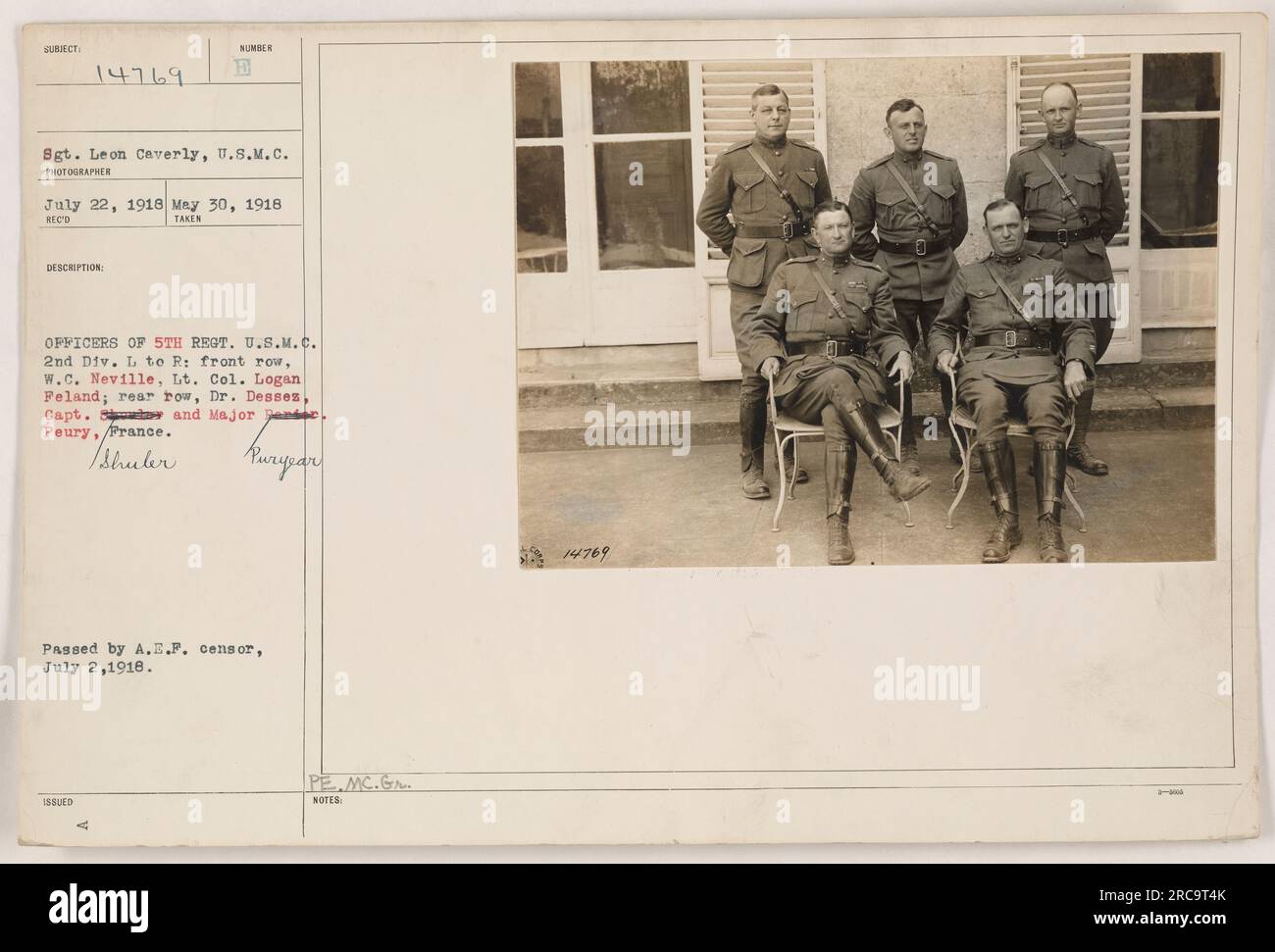 Caption: "Sgt. Leon Caverly, U.S.M.C. (front row, second from left ...