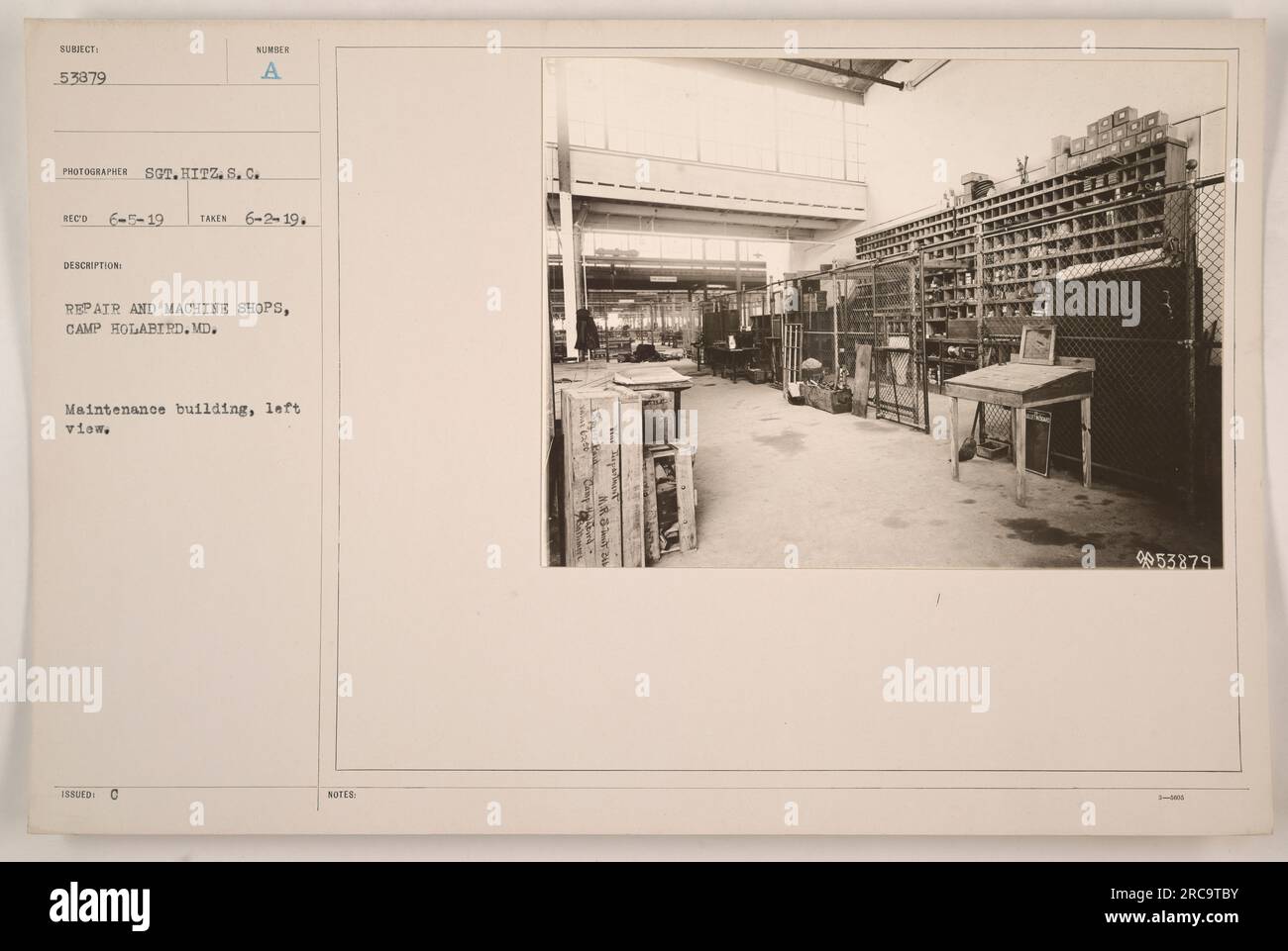 Caption: "Repair and Machine shops at Camp Holabird, Maryland. This ...