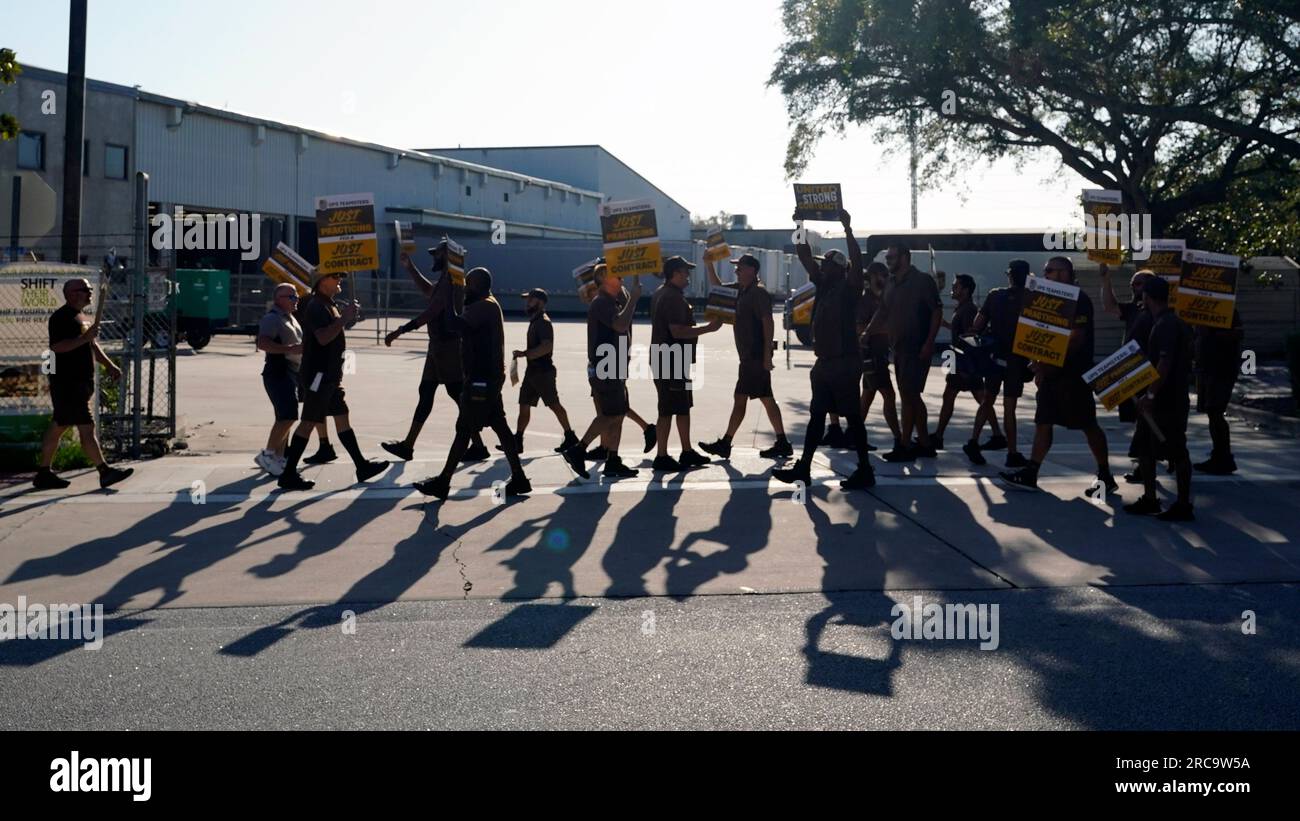 UPS workers go through a rehearsal of a pending strike at the UPS ...