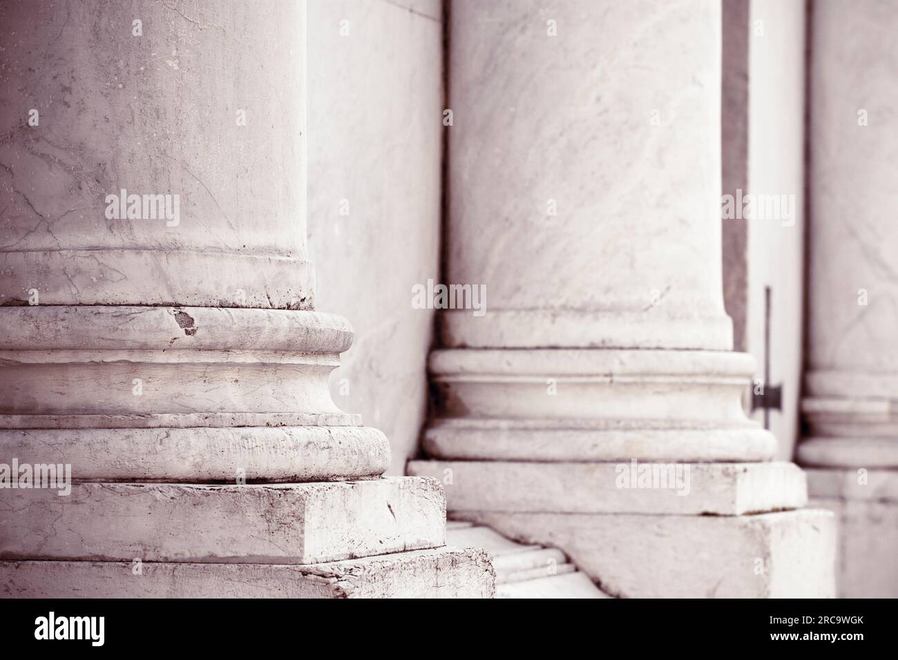 Base of the marble columns of a romanesque medieval Italian church ...