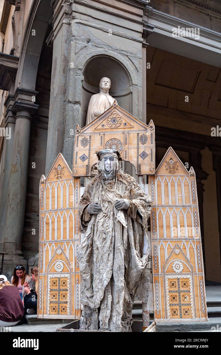 Florence, Italy - April 6, 2022: Mime artist performing in medieval ...