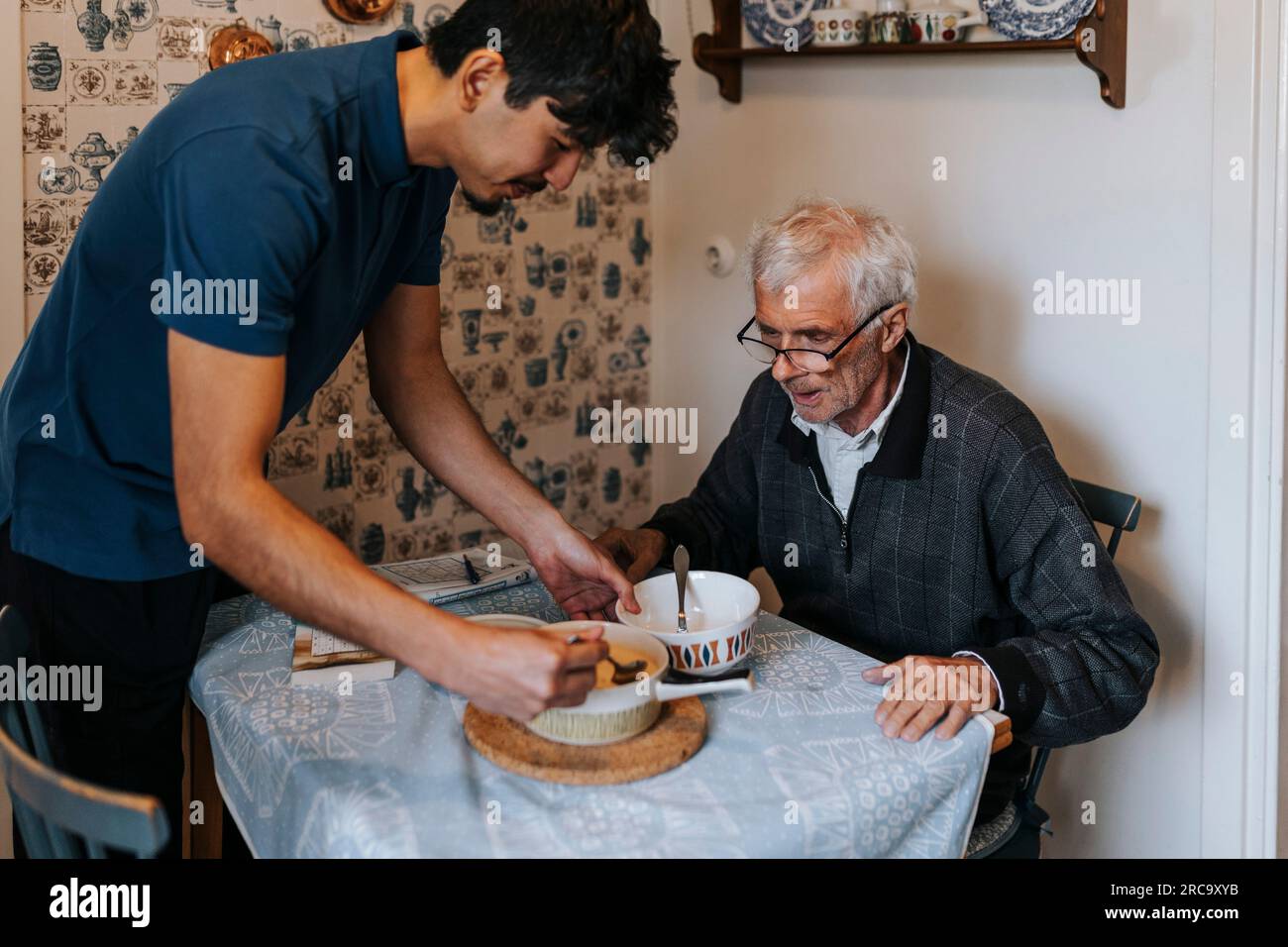 Sitting table man men male hi-res stock photography and images - Alamy