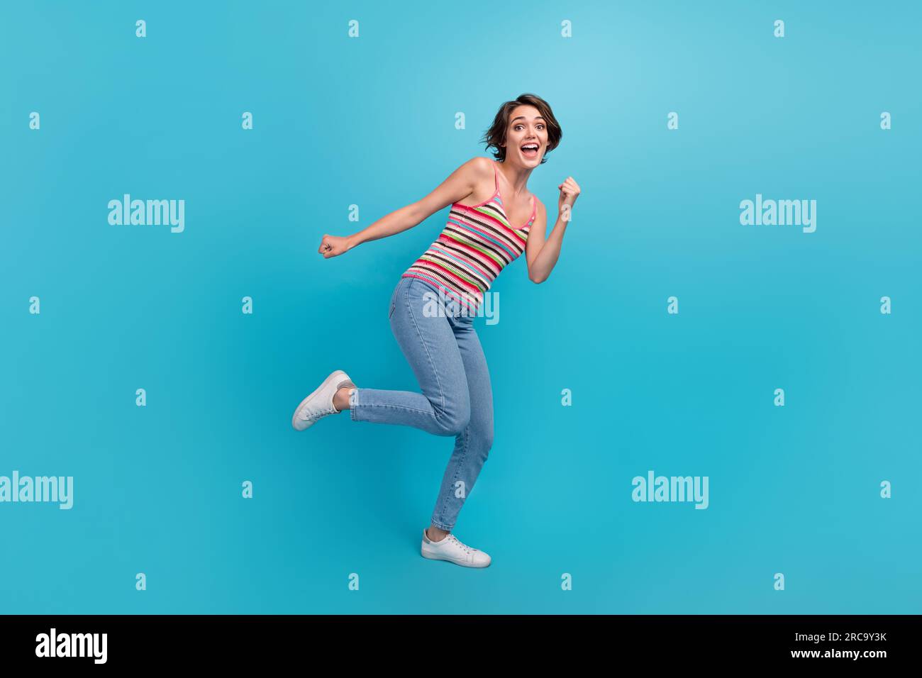 Full body portrait of lovely young lady have good mood dancing chilling ...