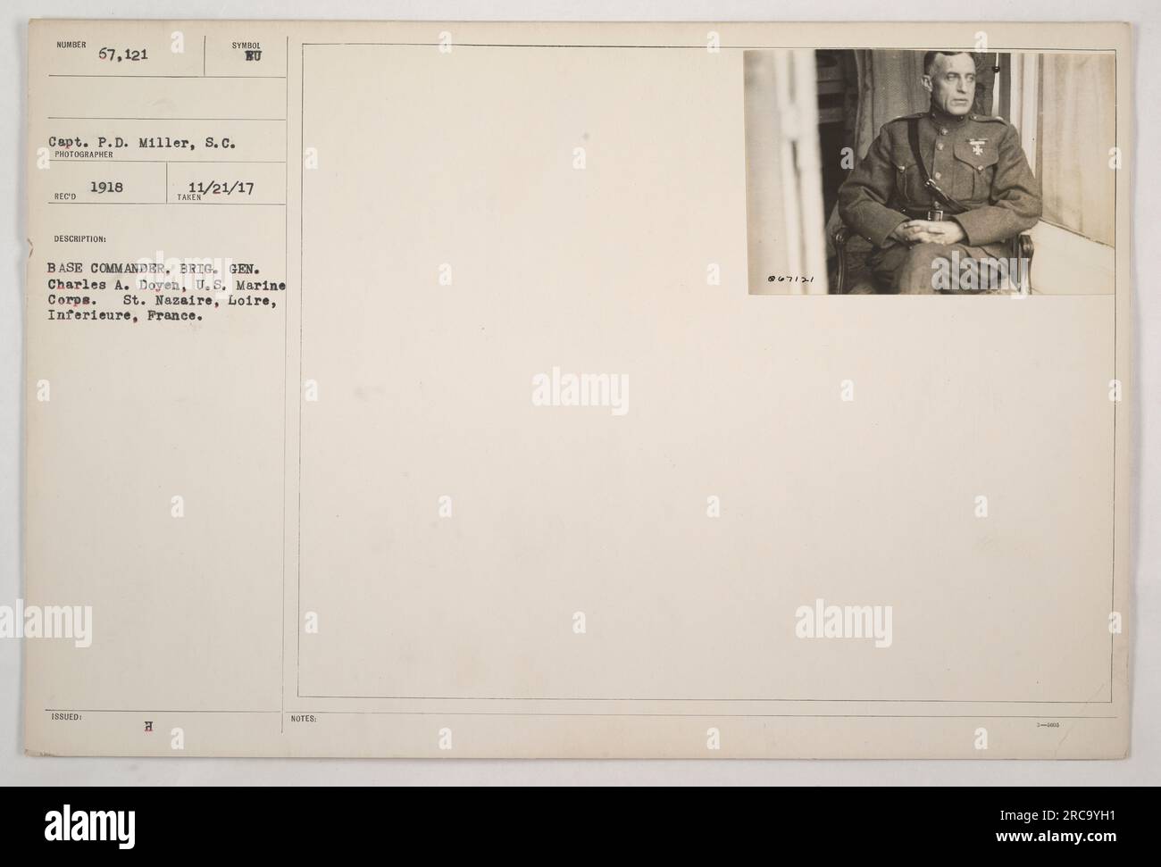 Brig. Gen. Charles A. Doyen, U.S. Marine Corps, stands as the base ...