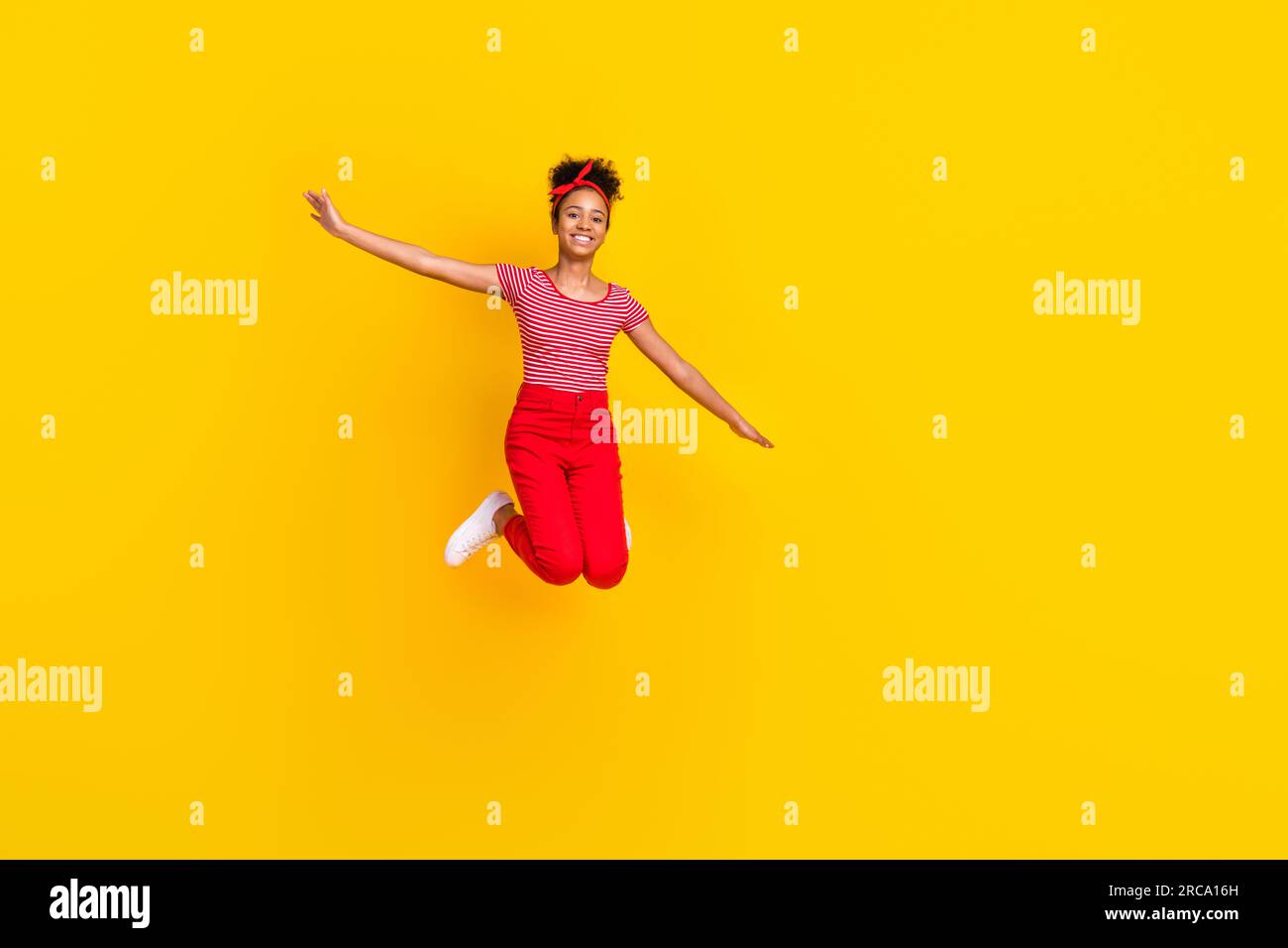 Full size photo of funky young girl jumping spread hands flight dressed ...