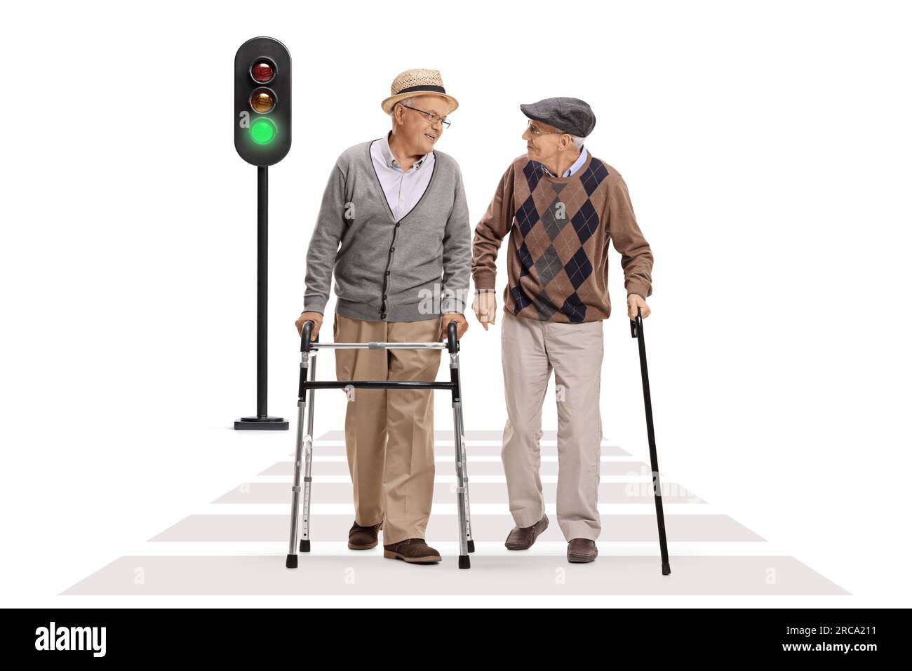Full length portrait of an elderly men crossing a street and talking ...