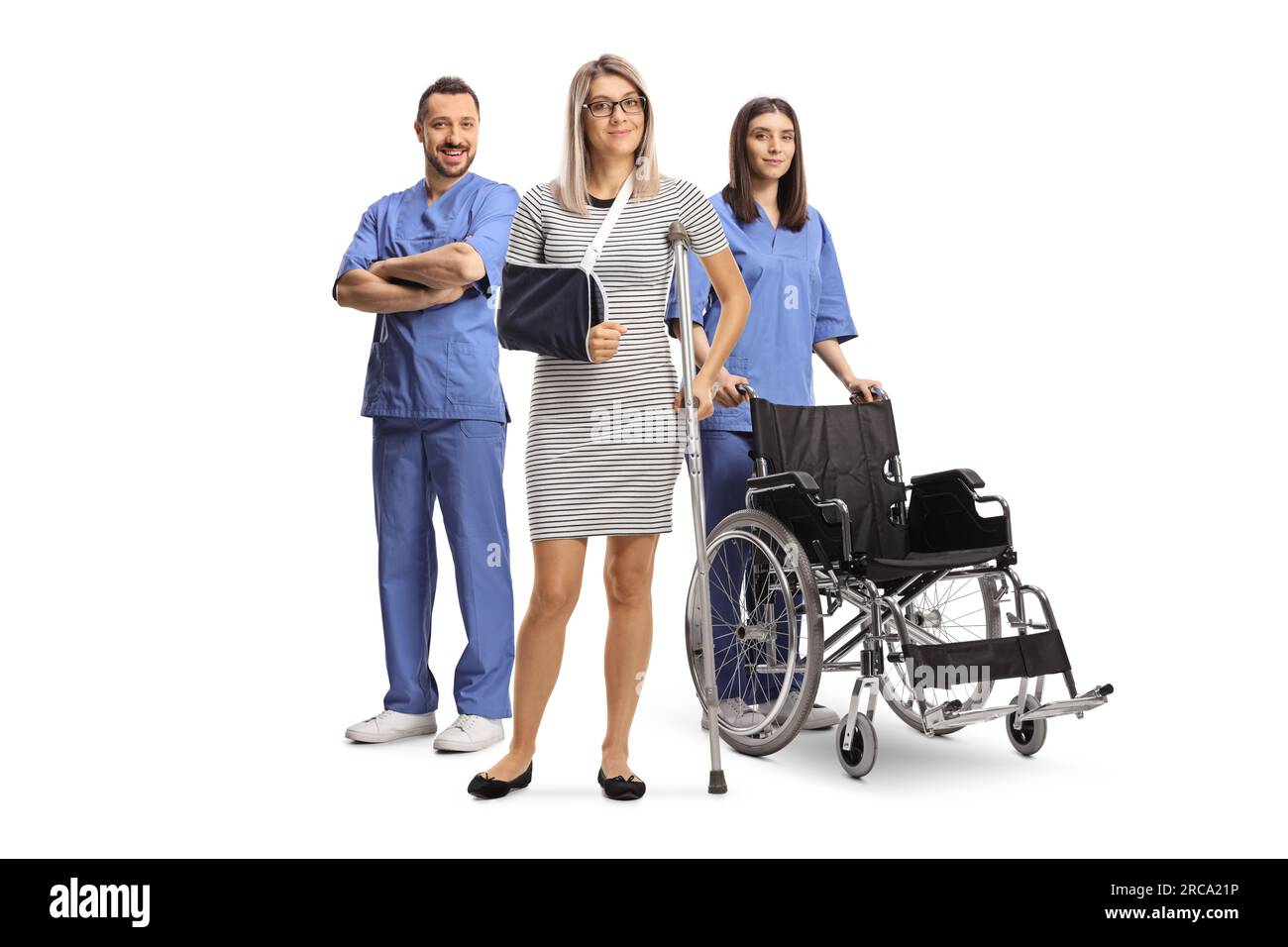 Woman with an injured arm and leg standing in front of health care ...