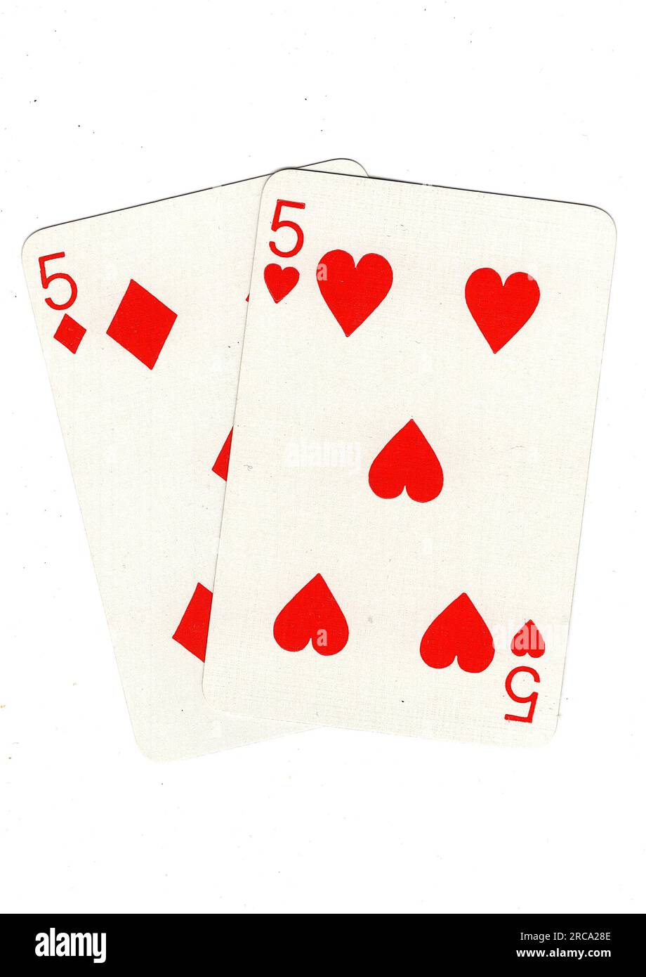 Vintage playing cards showing a pair of red fives on a white background ...