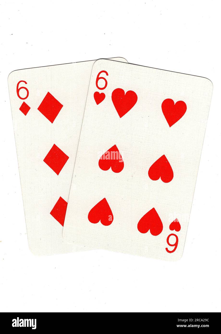 Vintage playing cards showing a pair of red sixes on a white background ...