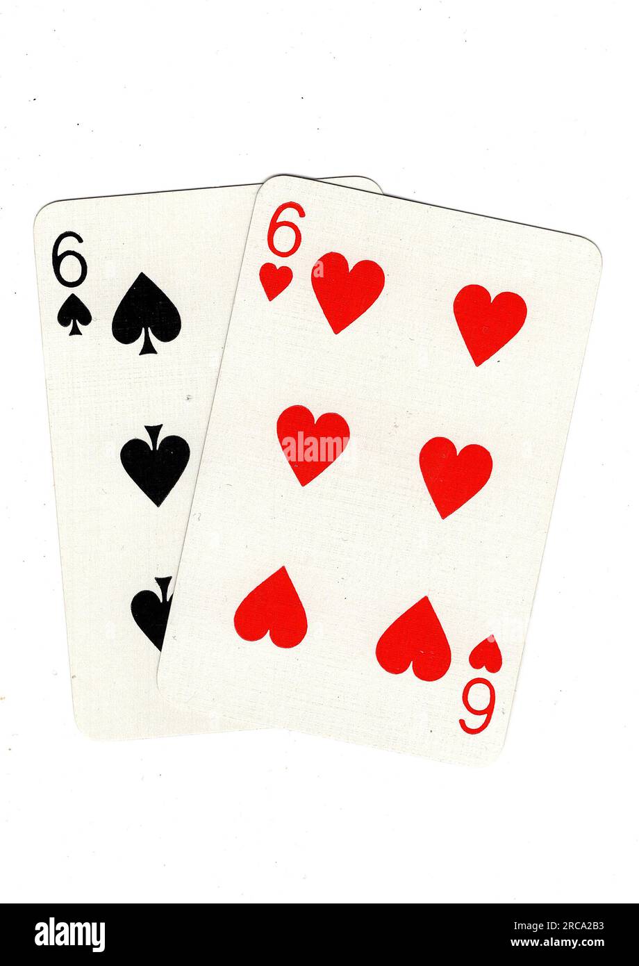 Vintage playing cards showing a pair of sixes on a white background ...