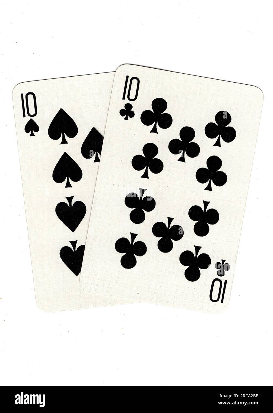 Vintage playing cards showing a pair of black tens on a white ...